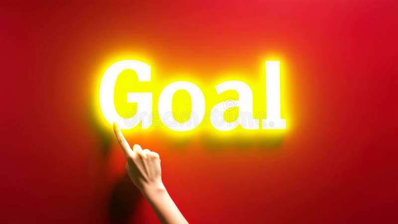 Finger Pointing at the Word "Goal" Lighting it Up from the Touch on a ...