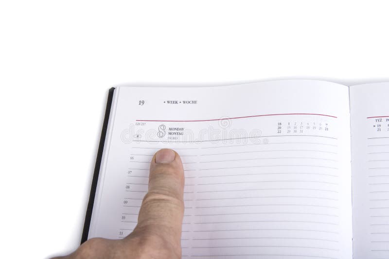 Finger Points on a Date in the Notebook Stock Photo - Image of ...