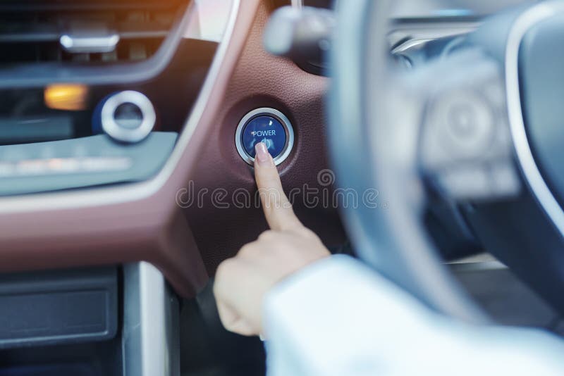 Finger Press a Car Ignition Button or START Engine Inside Modern Electric Automobile. Keyless ...
