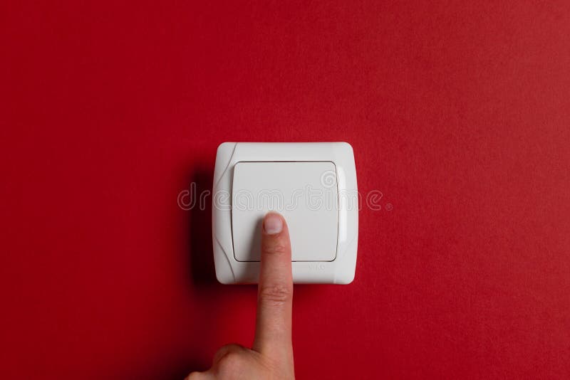 Finger Press Light Switch on a Bright Red Background Stock Image ...