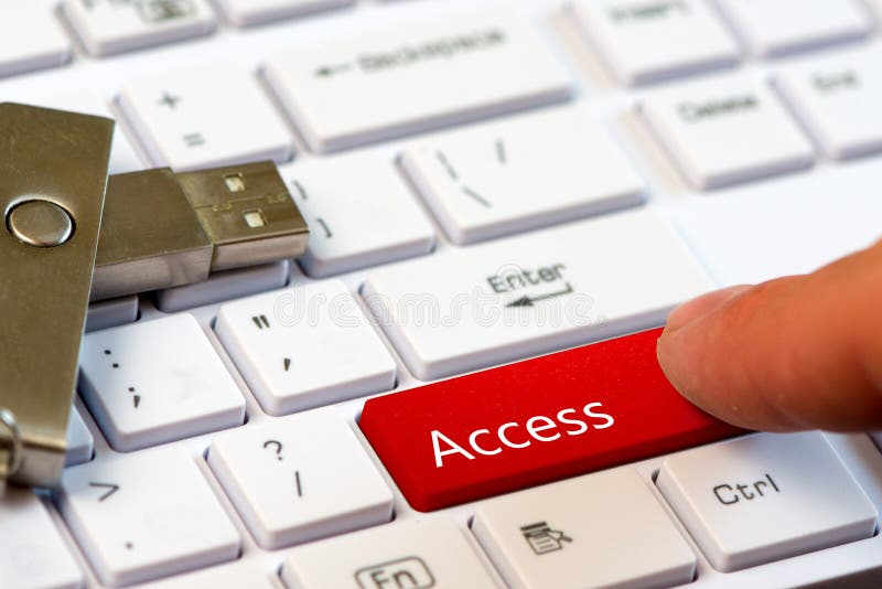 A Finger Press a Red Button with Text Access on a White Keyboard with ...