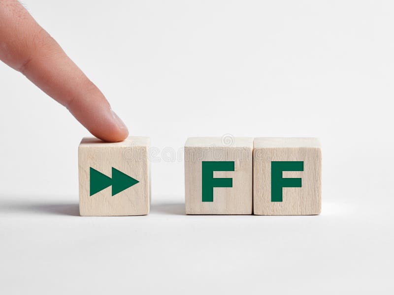 Finger Presses the Fast Forward FF Button on Wooden Cubes Stock Image ...
