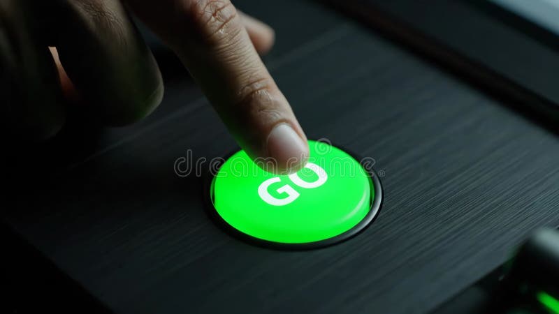 Finger Presses Green Go Button on Dark Surface, Ready To Activate Stock ...