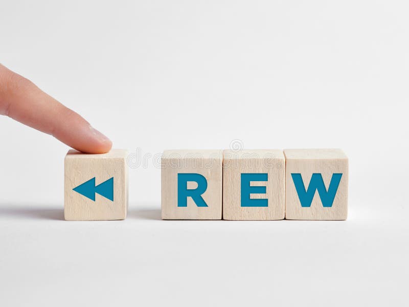 Finger Presses the Rewind REW Button on Wooden Cubes Stock Image ...