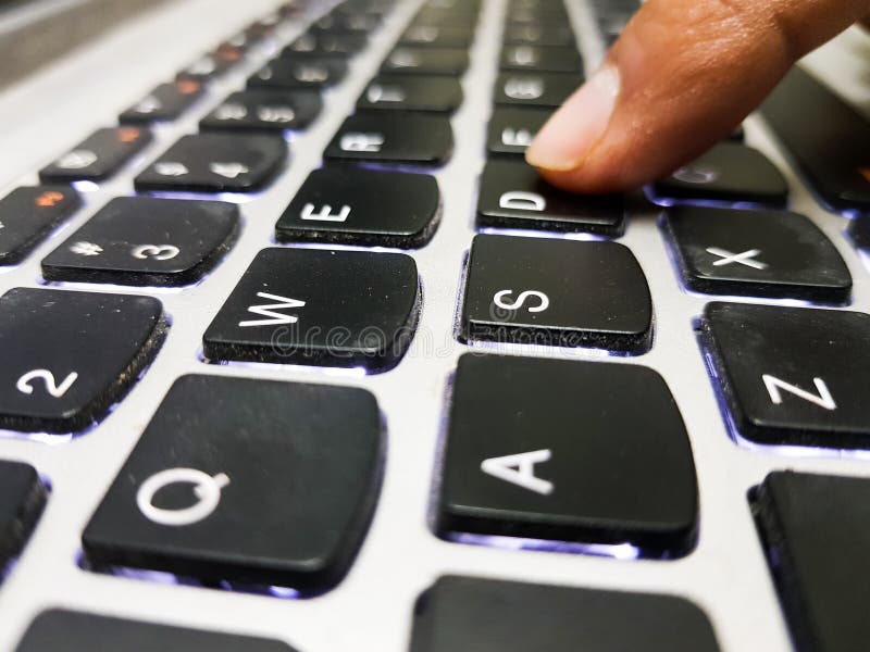 A Finger Pressing the D Key on an Keyboard on a Laptop Stock Photo ...