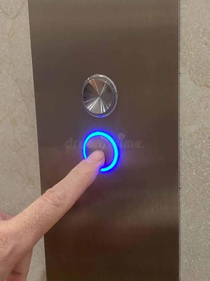 Finger Pressing Elevator Button Down in Blue Light Stock Photo - Image of corporate, lift: 261099406