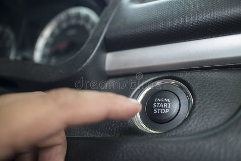 The Finger Pressing the Engine Start Stop Button of a Car Stock Photo ...