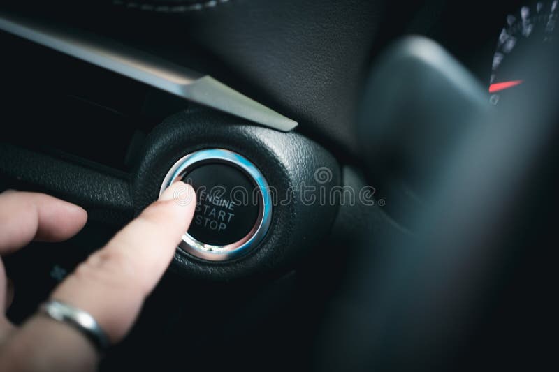 Finger Pressing the Engine Start Stop Button of a Car Stock Image ...
