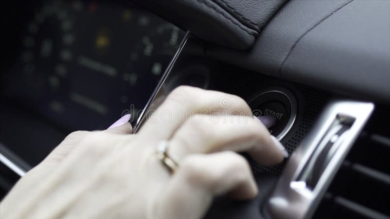 Finger Pressing the Engine Start Stop Button of a Car. Stock Stock ...
