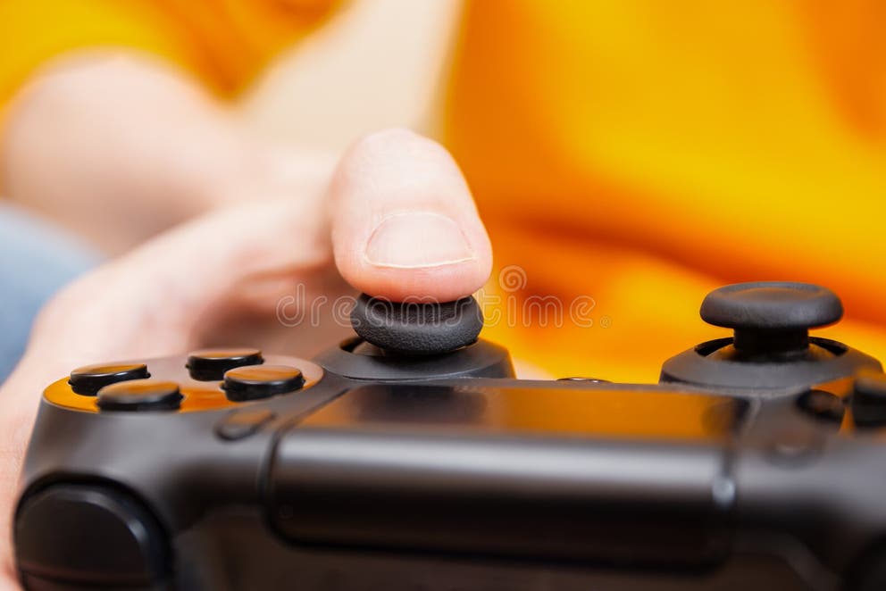 Finger Pressing Joystick on Black Game Controller Stock Image - Image ...