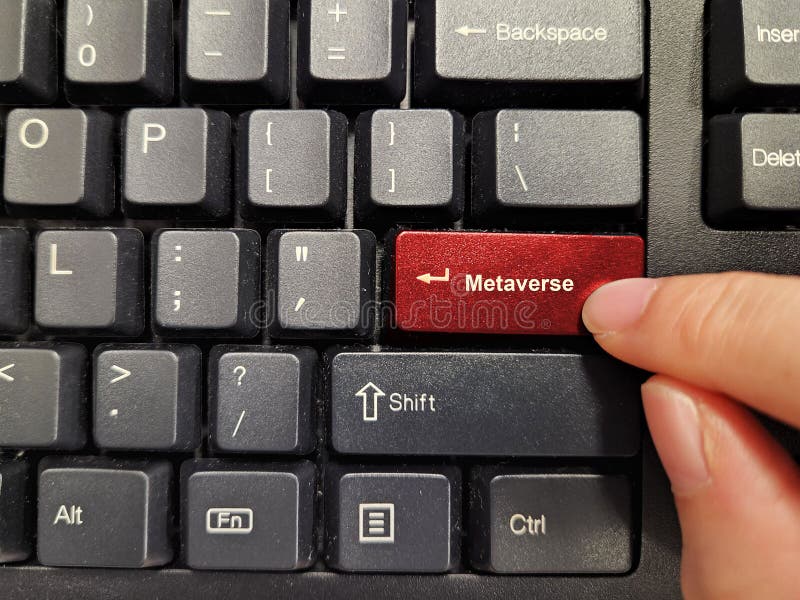 Finger Pressing Keyboard Key with the Word Metaverse Stock Photo ...
