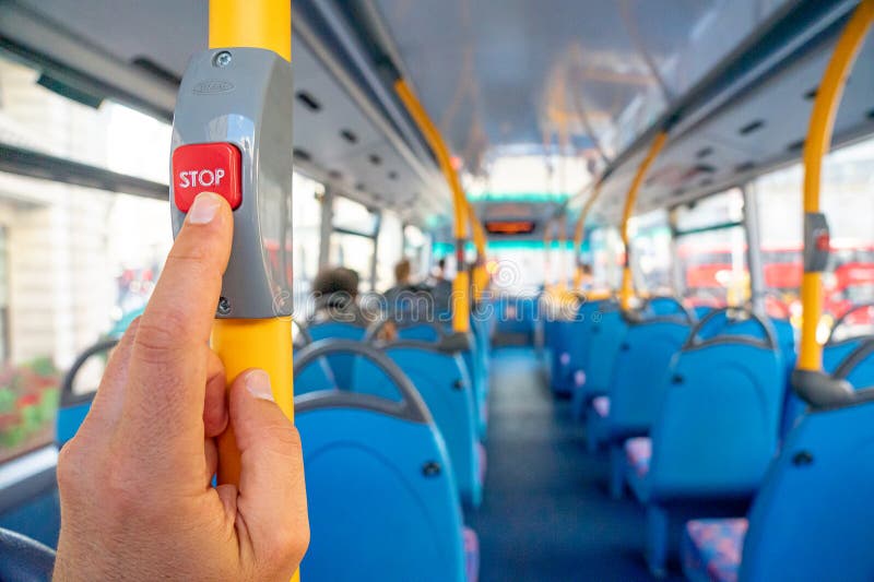 Finger Pressing the Red Stop Button on the First Floor of a Double ...