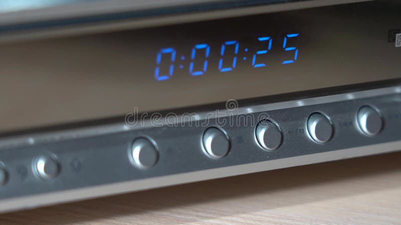 Pressing the Button on the Control Panel of the DVD Player with Your ...