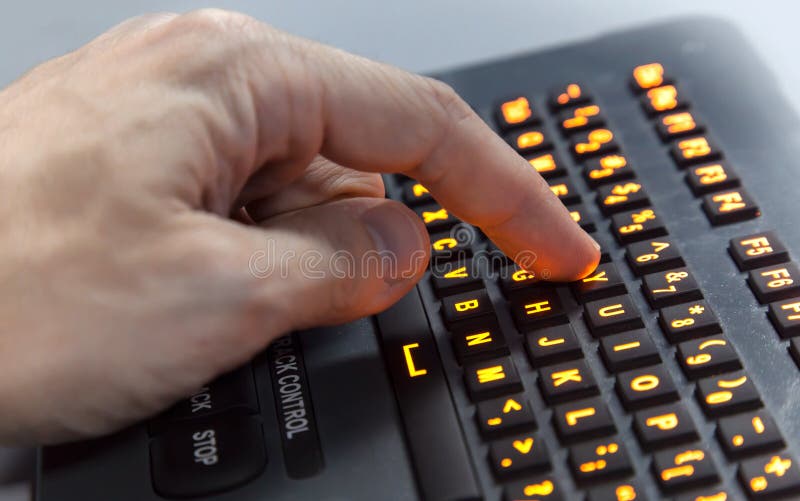 Finger Pressing Y Key on Illuminated Industrial Ke Stock Image - Image ...