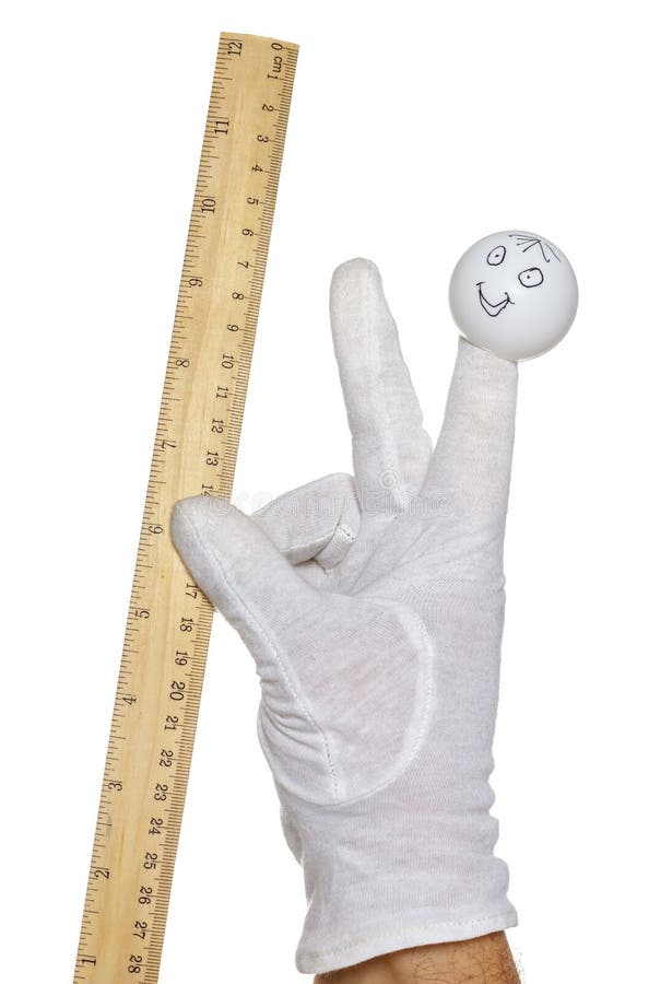 Finger Puppet Holding Metric Inch Ruler Stock Photos - Free & Royalty ...
