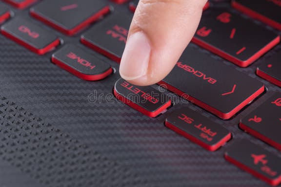 Finger Pushing Delete Button on Laptop Keyboard Stock Photo - Image of ...