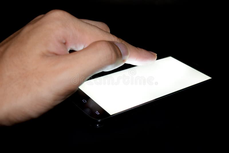 Finger Touch White Screen Mobile Telephone in the Darkroom Stock Photo ...