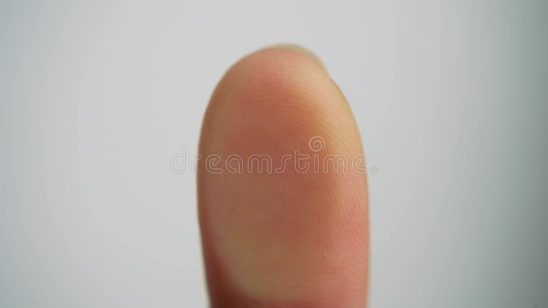 Finger Touches the Camera, Showing a Unique Fingerprint. the Concept of ...