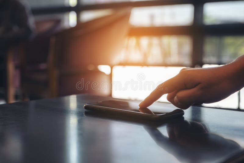 A Finger Touching and Pointing at Mobile Phone Stock Photo - Image of ...