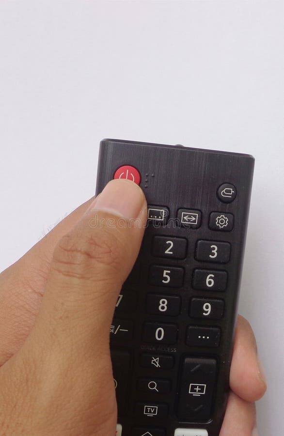 Finger Touching the Red Power Button on a TV Remote Stock Photo - Image ...