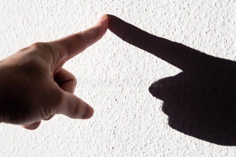 Finger with dark shadow stock photo. Image of shape - 199691142