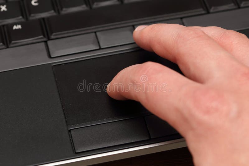 Finger on touchpad stock photo. Image of interface, touch - 40579378