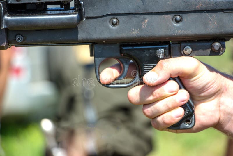 Finger on the trigger stock image. Image of clothing - 98039781