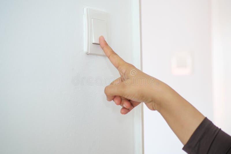 A Finger Turning on Lighting Switch . Stock Image - Image of wall ...
