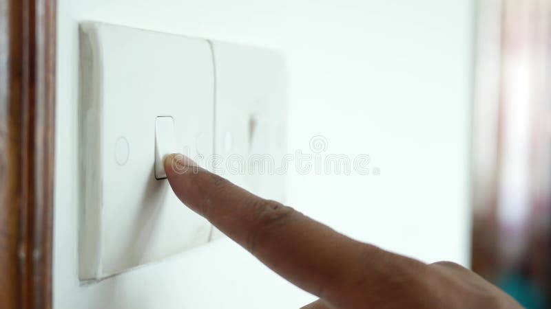 A Finger Turning on Lighting Switch . Stock Video - Video of ...