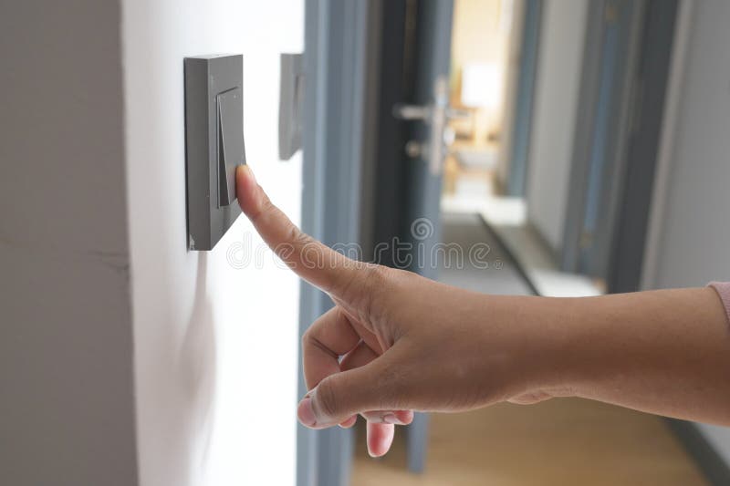 A Finger Turning on Lighting Switch . Stock Image - Image of interior ...