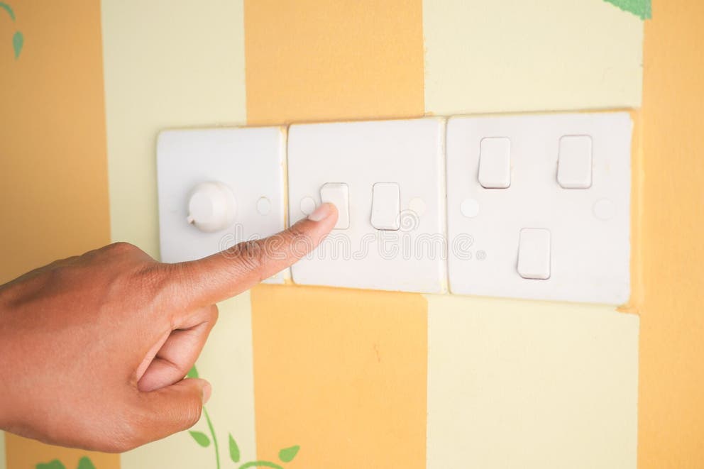 A Finger Turning on Lighting Switch . Stock Image - Image of button ...