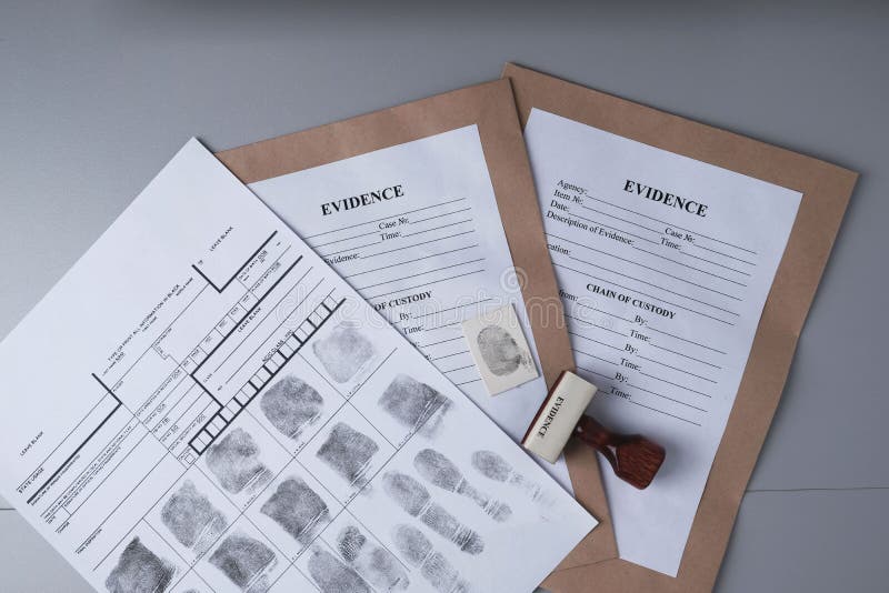 Fingerprint Card and Paper Envelopes for Packaging Evidence on Gray ...