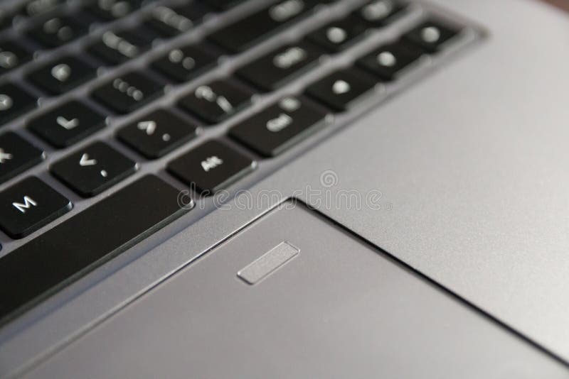 Fingerprint Scanner on Trackpad of a Laptop Stock Photo - Image of ...