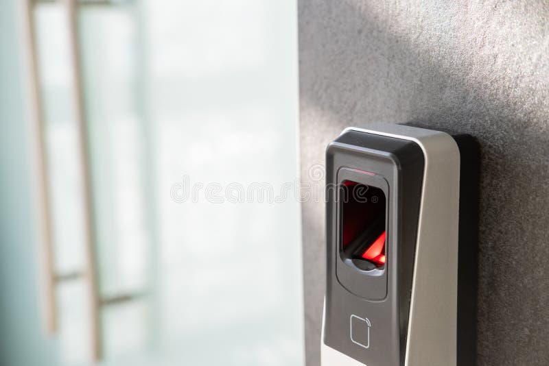 Fingerprint Scanner on the Wall in the Office Space. Modern Technology ...