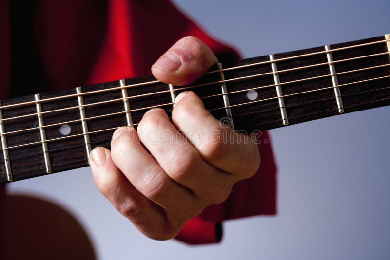 Fingers of a Guitar Player Playing Acoustic Guitar Stock Photo - Image ...