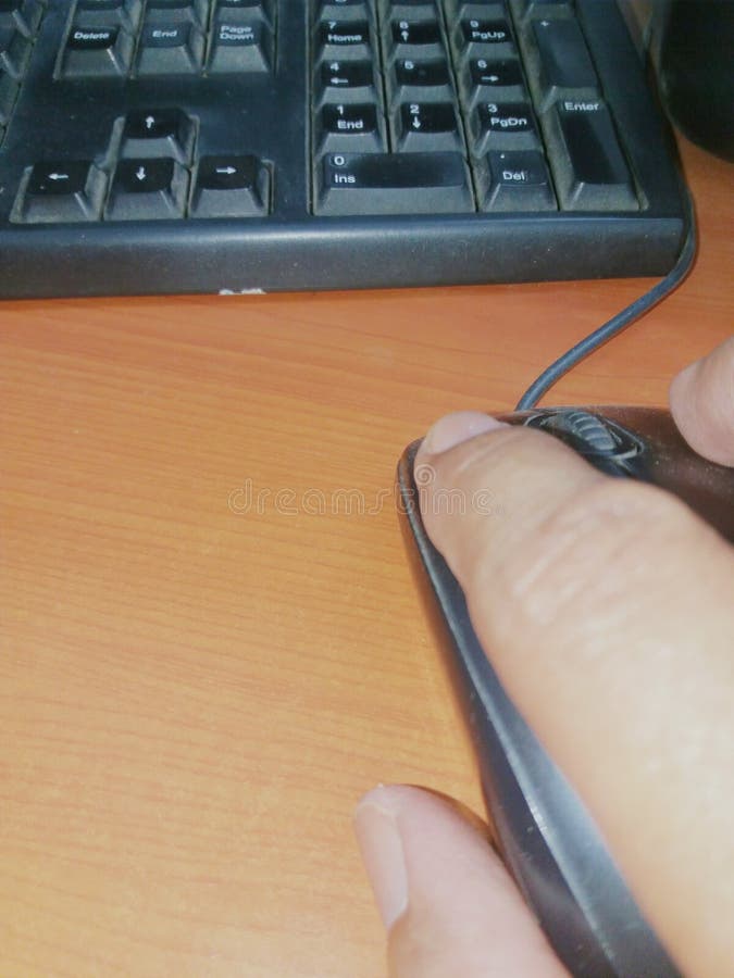Fingers Holding Mouse on Computer Desk and Keyboard Stock Image - Image ...