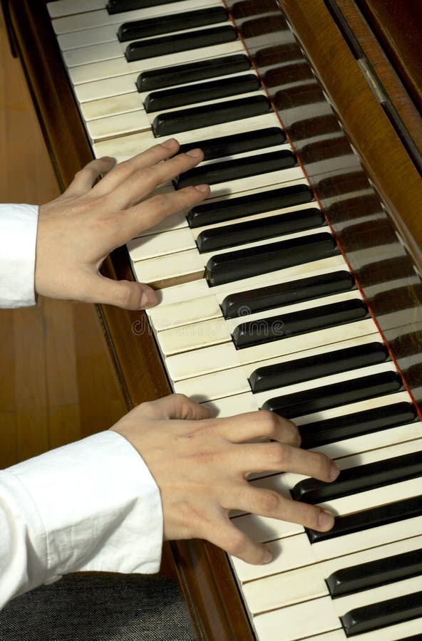 Fingers of a Piano Teacher stock photo. Image of competitor - 1721828