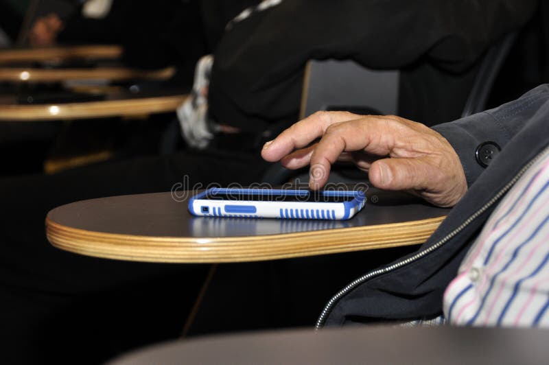 Fingers on smart-phone stock image. Image of armrest - 38082737