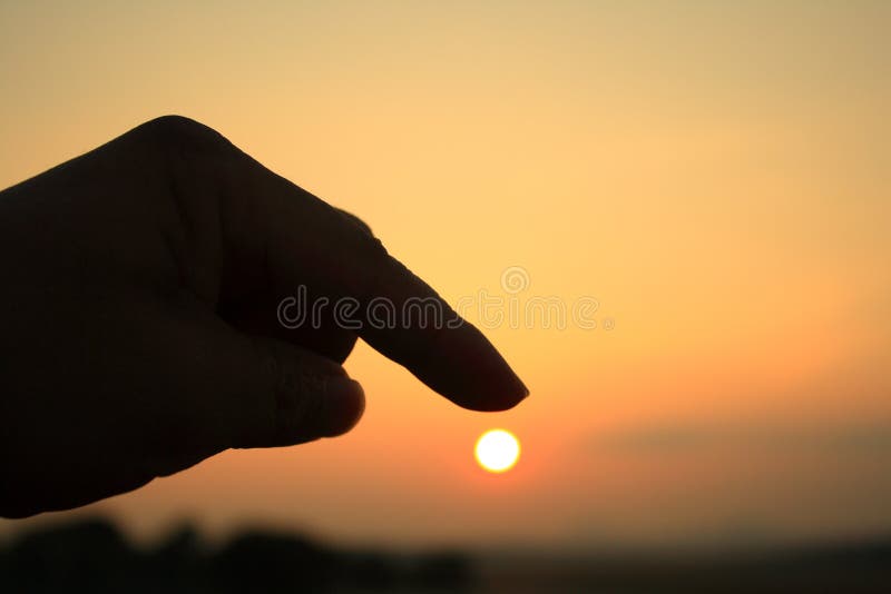 Fingers on sunset stock photo. Image of light, catching - 45857546