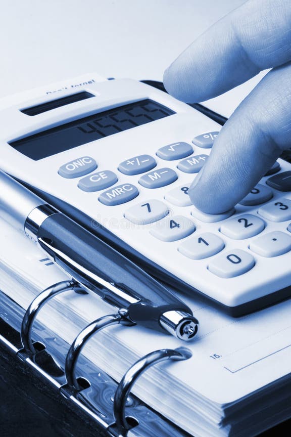 Fingers Typing on a Calculator and a Pen Stock Photo - Image of office ...