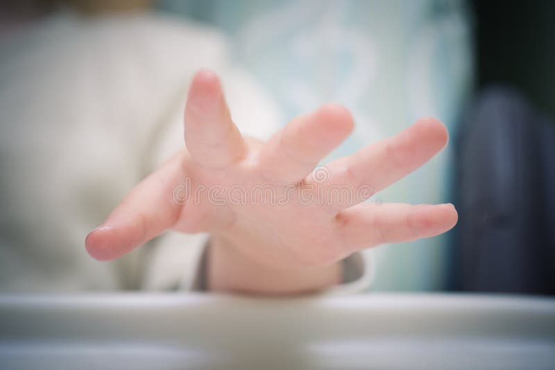 At the fingertips stock image. Image of infant, table - 7163043