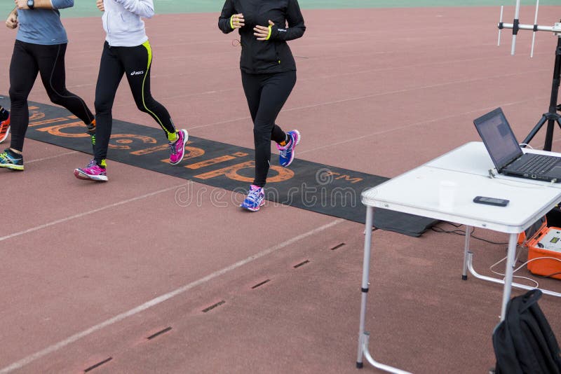 Runners Passing a Timekeeping Checkpoint Editorial Photo - Image of ...