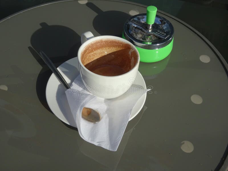 Finished Cup of Coffee beside Ashtray Stock Image - Image of smoke ...