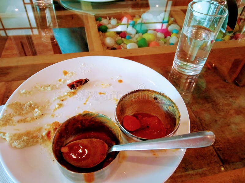 Finished Dinnner Plate on Wooden Dining Table Stock Image - Image of ...