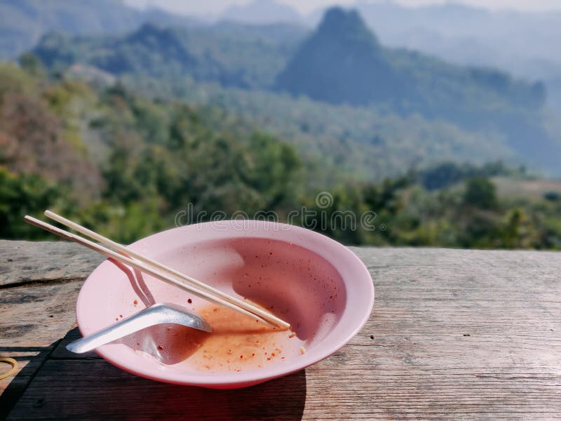 The Finished Eating Bowl on the Table with the Mountain View. Stock ...