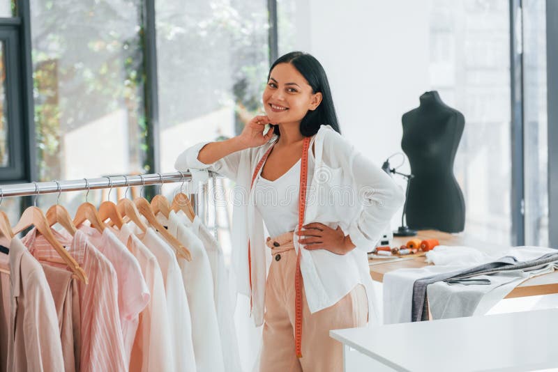 With Finished Product. Seamstress is in Her Office that is with ...