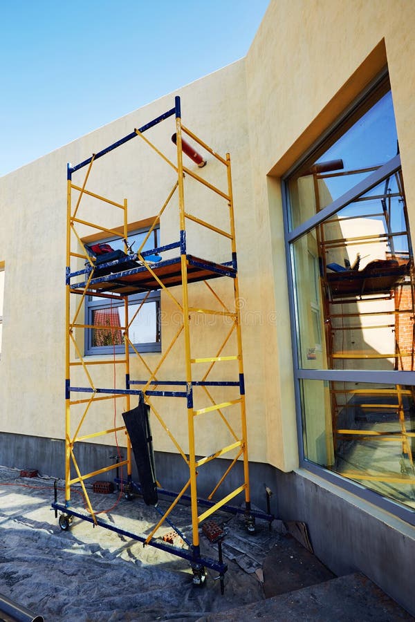 Finishing Building on the Facade of the Building with the Use of Stock ...
