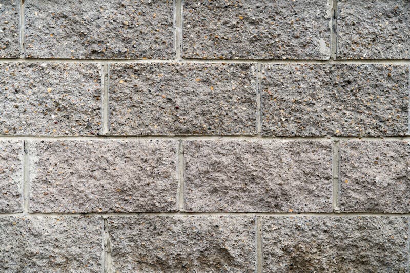 Finishing the Foundation of the House with a Decorative Stone from a ...