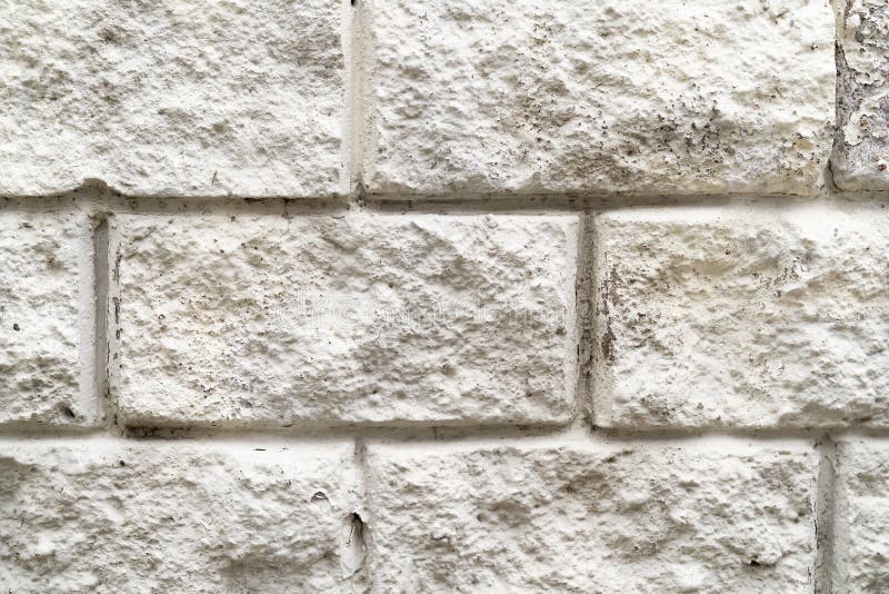 Finishing the Foundation of the House with a Decorative Stone from a ...