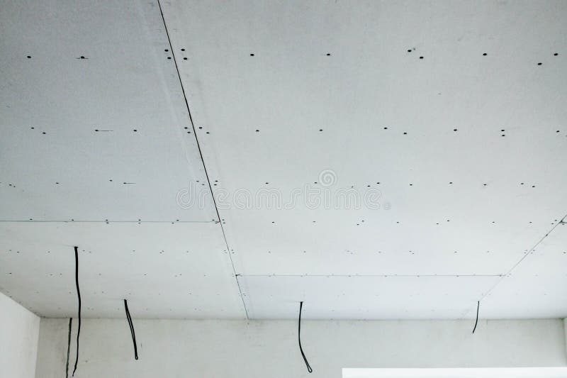 Finishing Installation of Suspended Ceiling at the Construction Site ...